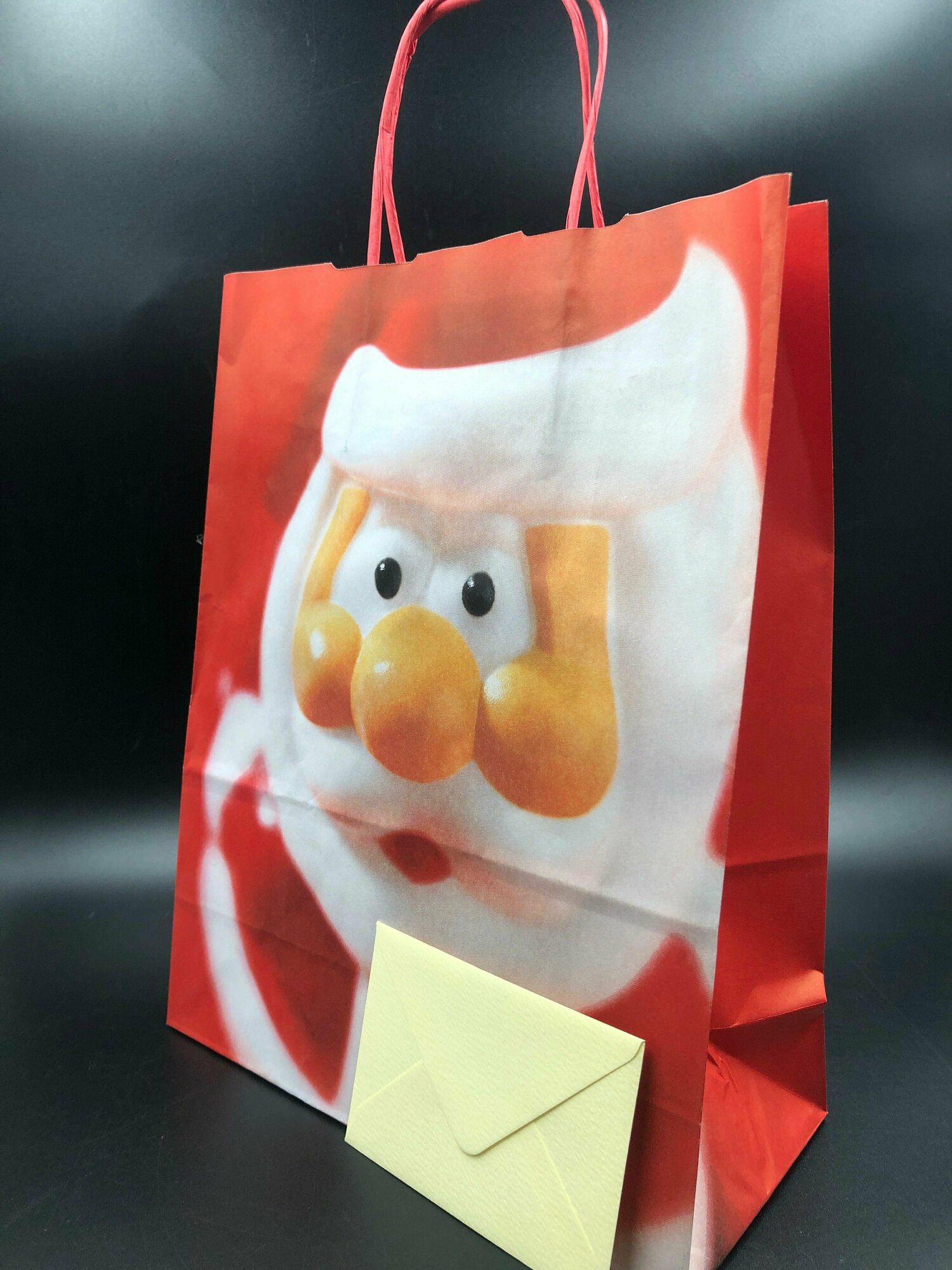 Пакет + конверт Новогодний 25 шт. Toptwist Nikolaus красный, 240х310х110 арт.46, конверты 25 шт. Prisma "Замша (слоновая кость)" дизайнерский 78х110 мм с треугольным клапаном