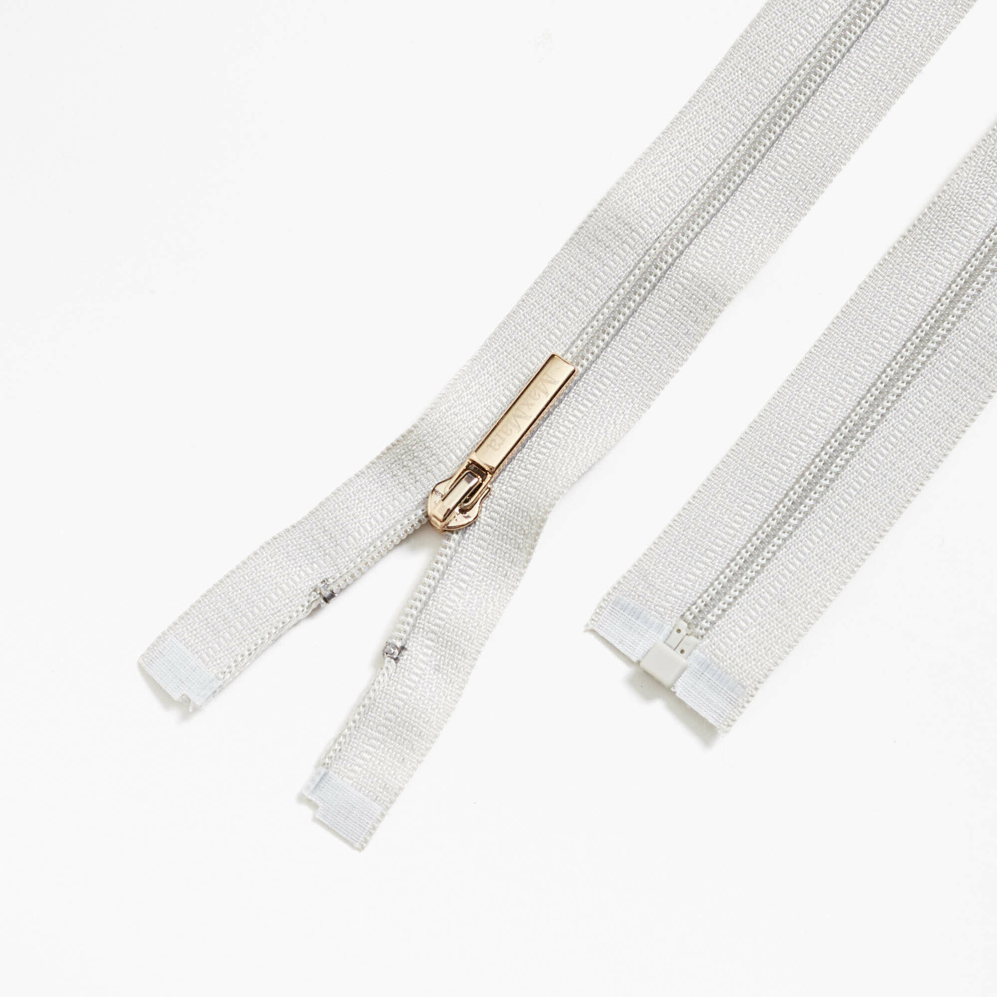 Молния разъемная спиральная пластик Т4 - 55см ( 1 зам.)