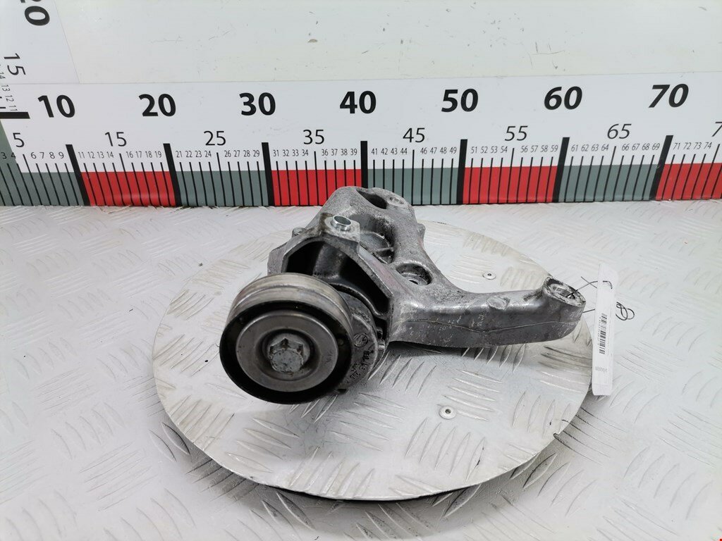 Натяжитель ремня генератора (приводного поликлинового ремня Skoda Octavia 1Z 03C145299Q арт. 1605821