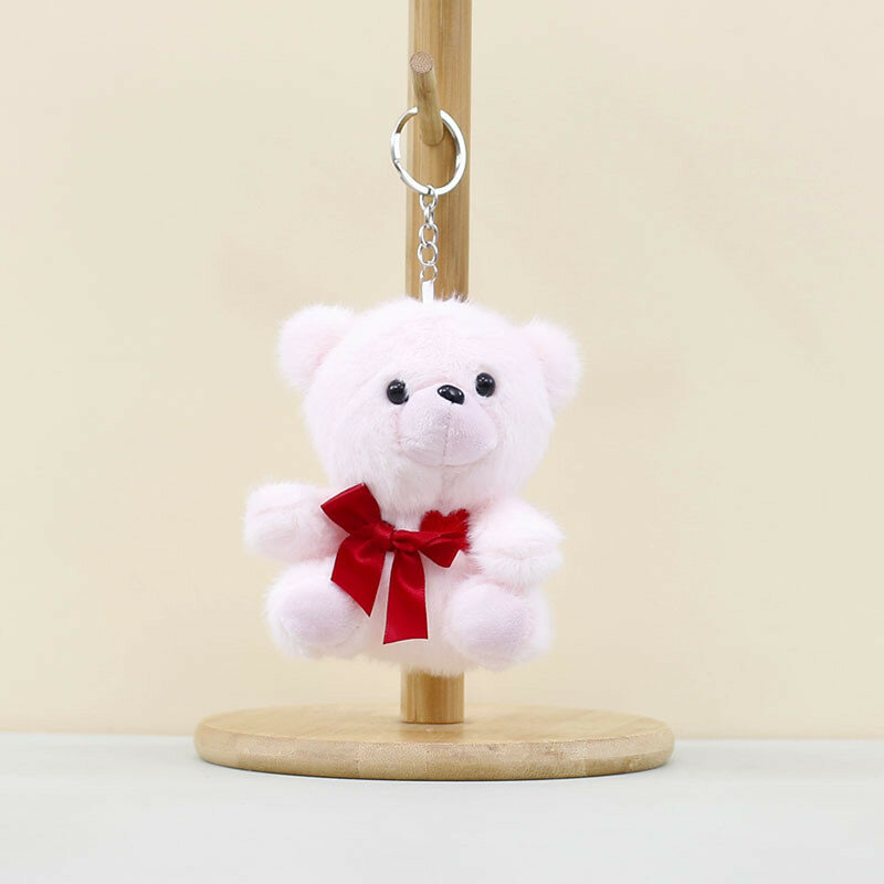 Charming bow and arrow teddy bear plush keychain in various colors for collectors