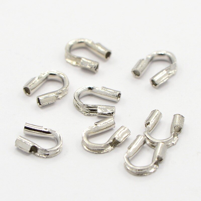 Концевики, 5х4мм (внутренний размер 0.7мм), защитные скобы, базовый материал - латунь, стального цвета, 2 грамма