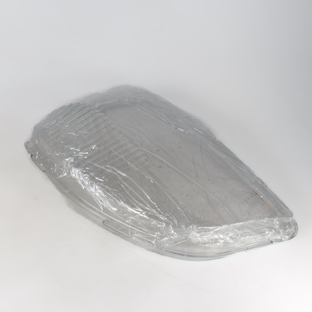 Стекло фары 2123 (левое) "BOSCH" н/о (пластик)