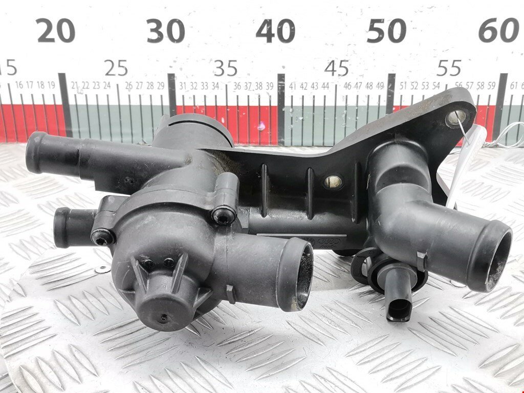 Корпус термостата Volkswagen Fox 03C121111B арт. 1894364