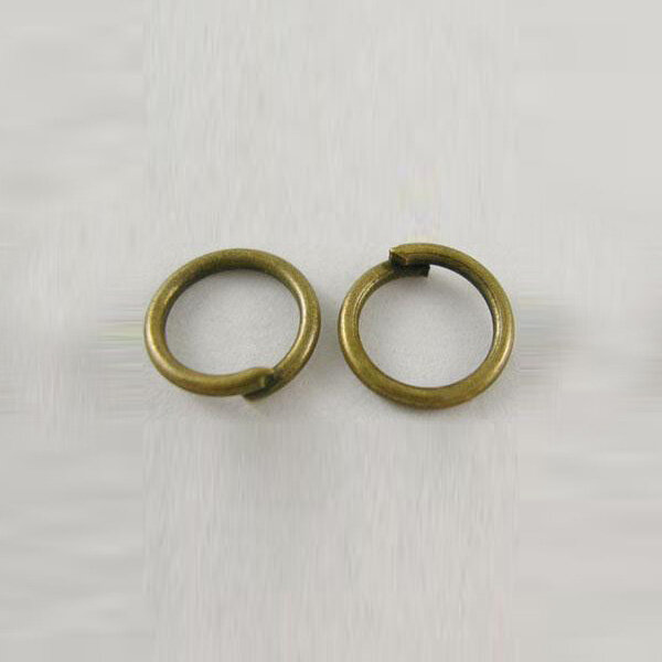Соединительное колечко, 7мм (толщина 1.0мм, внутренний размер 5мм), базовый материал - латунь, бронза, 10 грамм
