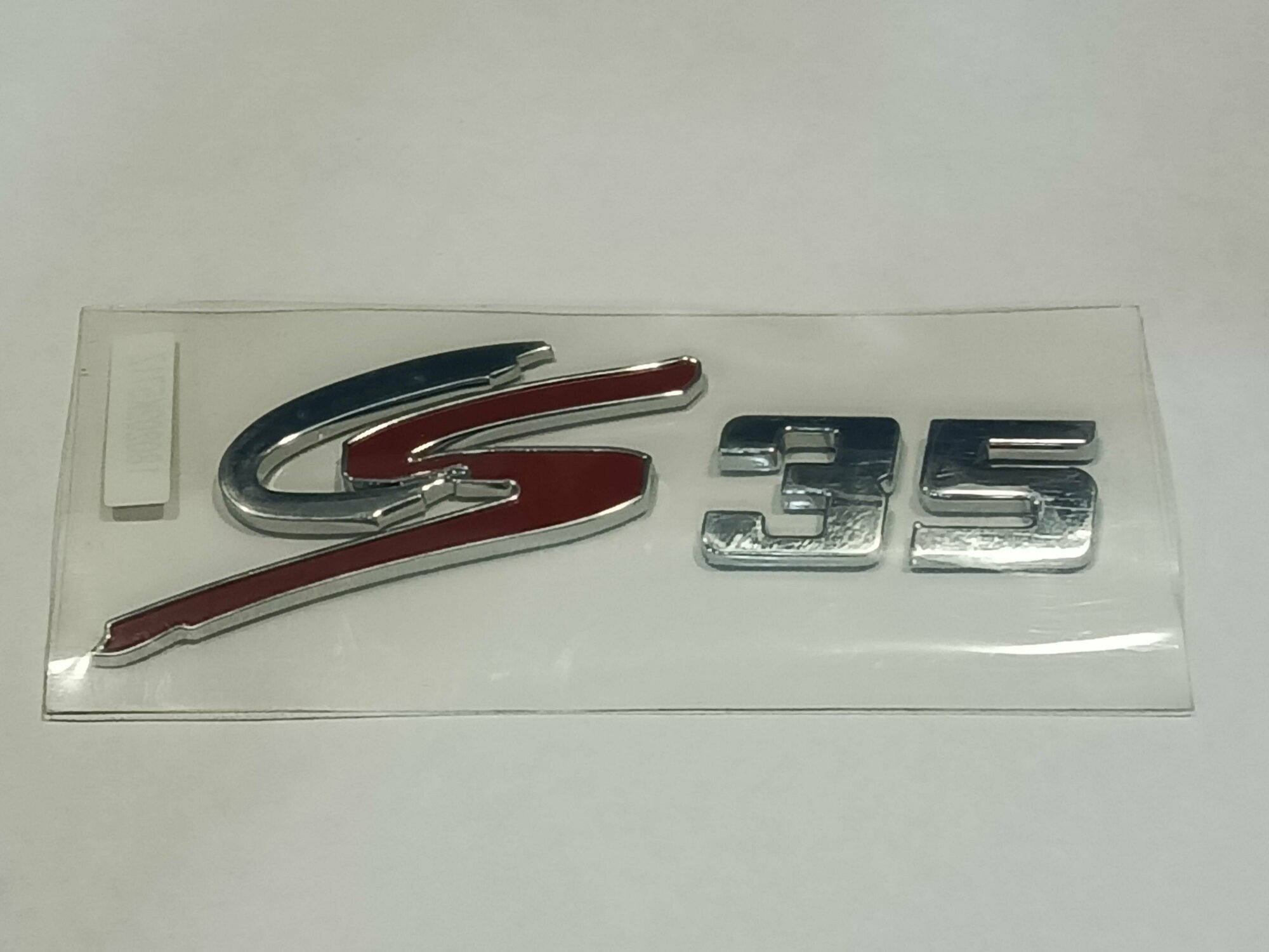 Эмблема, шильдик, логотип. Надпись "CS35" на багажник автомобиля Changan CS35