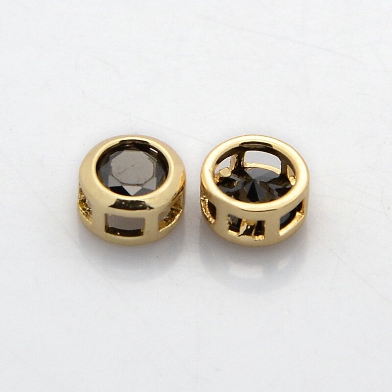 Бусина металлическая, 7х4мм, плоская, со стразом черного цвета, базовый материал - латунь, позолоченная, 1 шт.