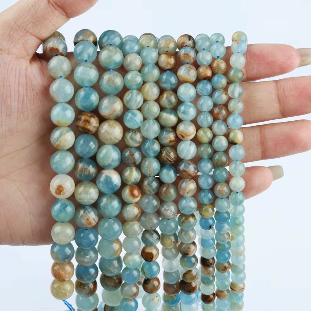 KamenOpt / Голубой Кальцит бусины шарик 10 мм, на нитке 38 см, из натурального камня