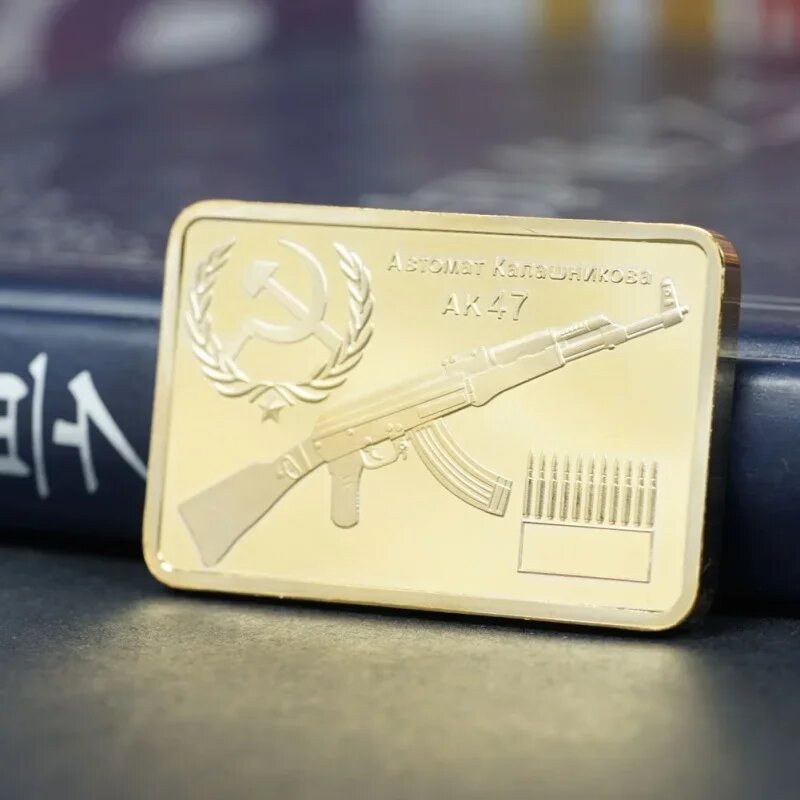 Реплика золотого слитка Калашникова