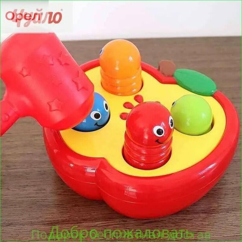Игрушка-стучалка — фото 1