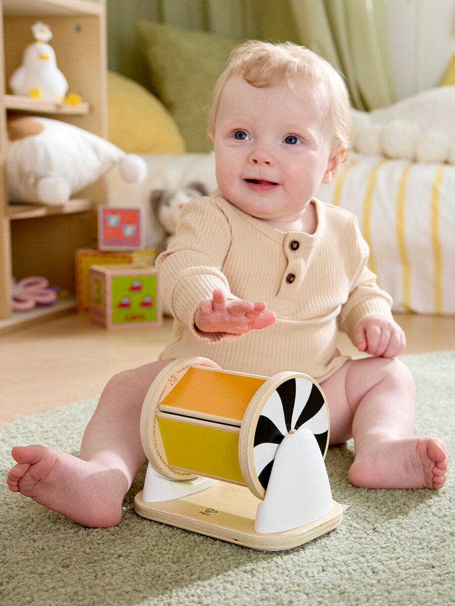 Развивающая игрушка Hape "Малышам", крутящийся барабан, с зеркалом