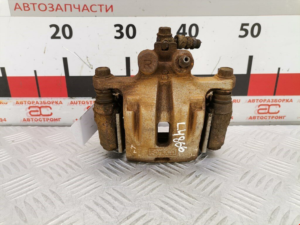 Суппорт задний правый Mazda CX-7 (ER) L2322661XA арт. 938163