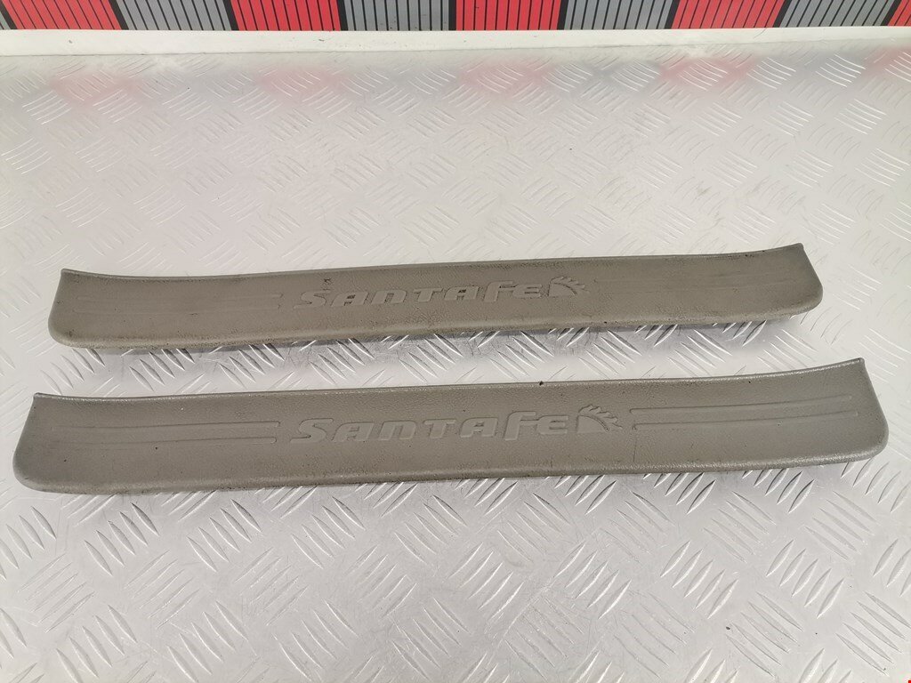 Накладка декоративная на порог левая Hyundai Santa Fe 2 (CM) 858852B000 арт. 1435123
