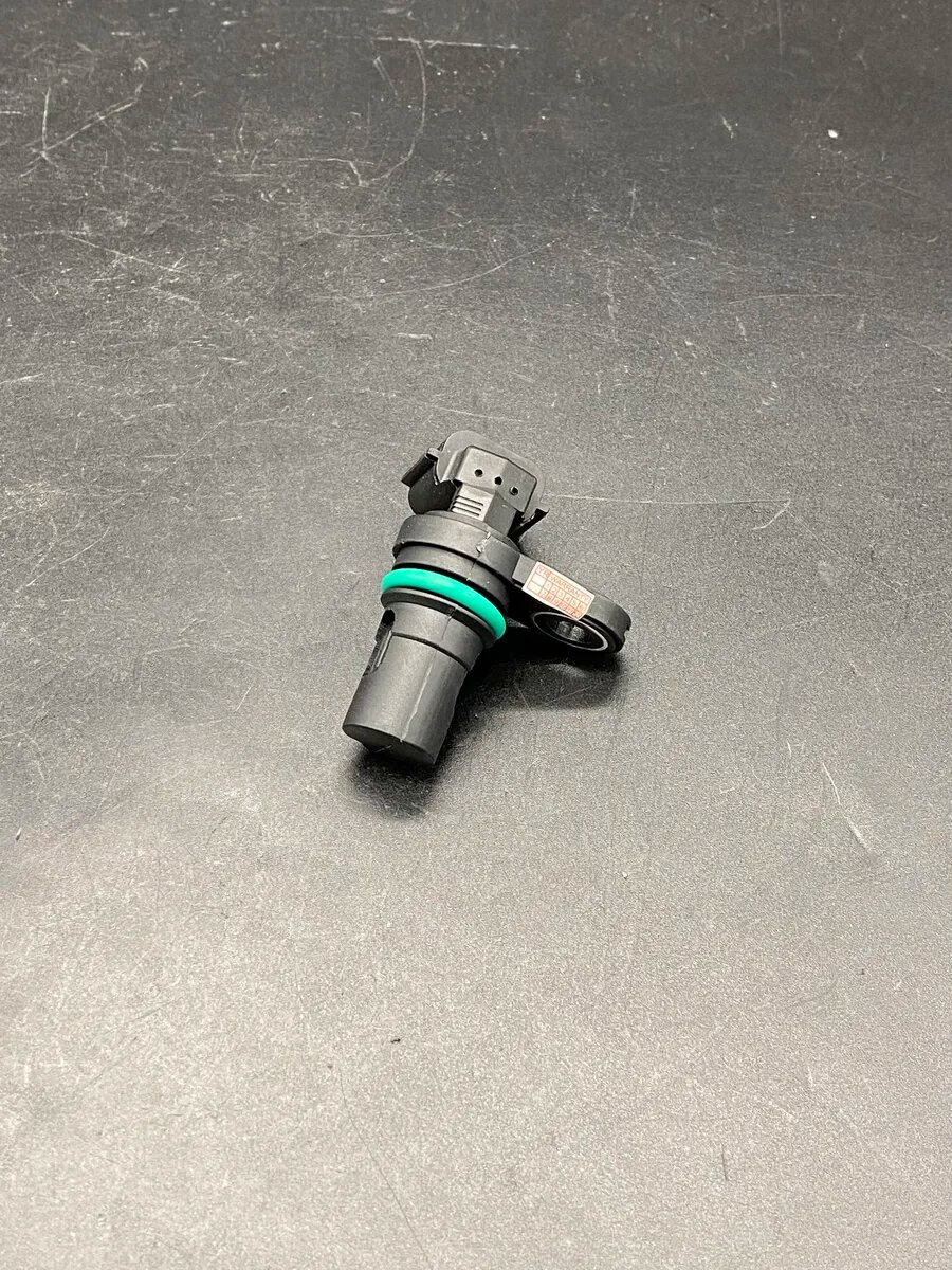 Датчик положения распредвала Новое Cargoparts