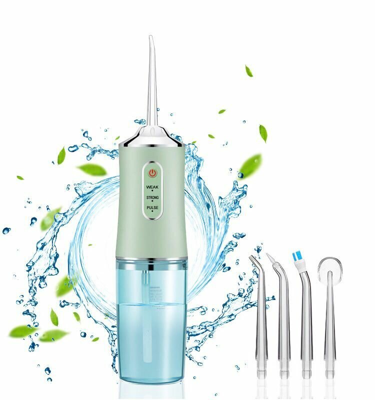 Ирригатор для полости рта с 4 насадками зеленный.