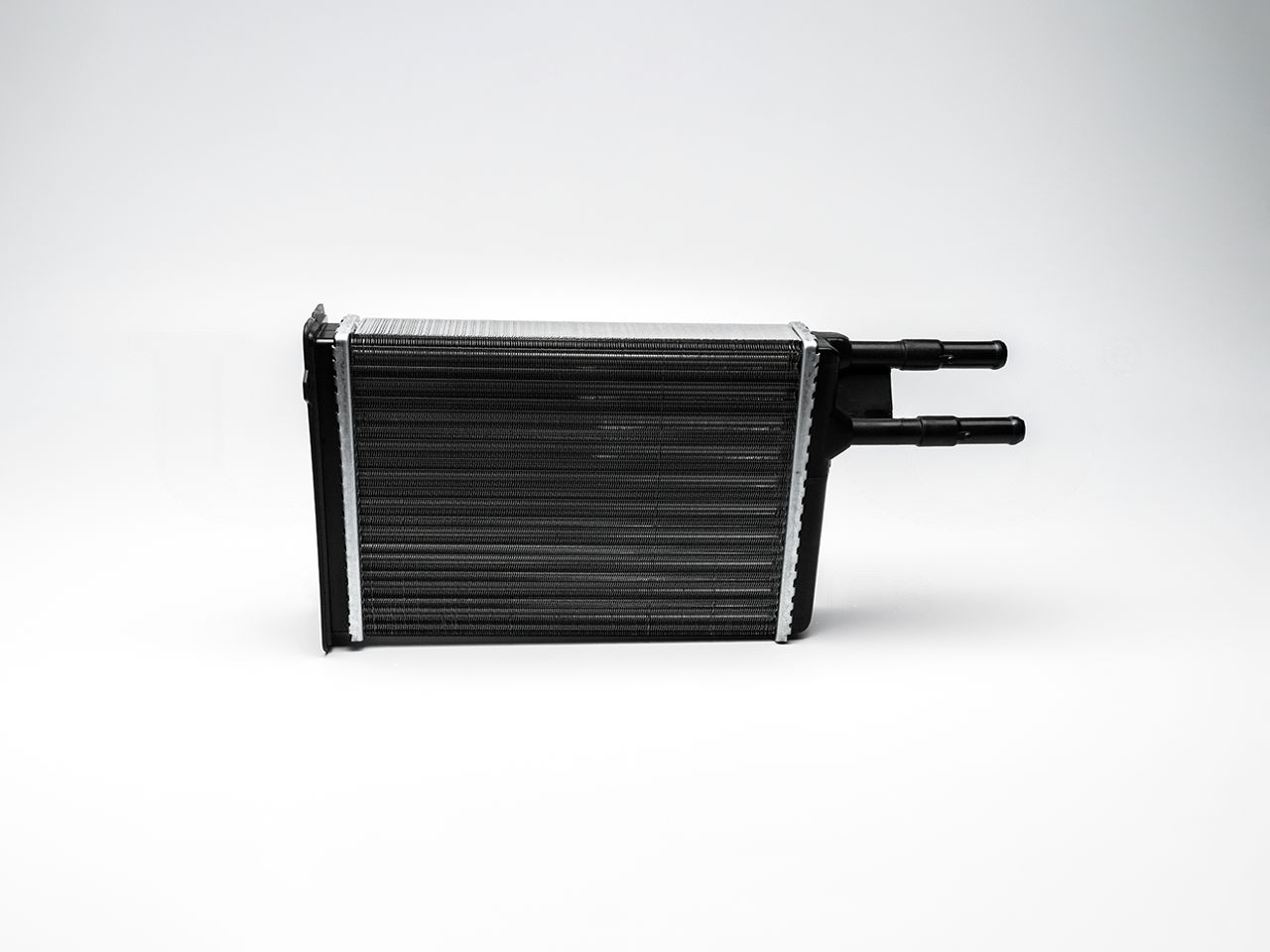 UNIO RAD-20051 (1307156080 / 1320774080 / 1320776080) радиатор отопителя Peugeot (Пежо) Boxer (Боксер) 94-, Citroen (Ситроен)