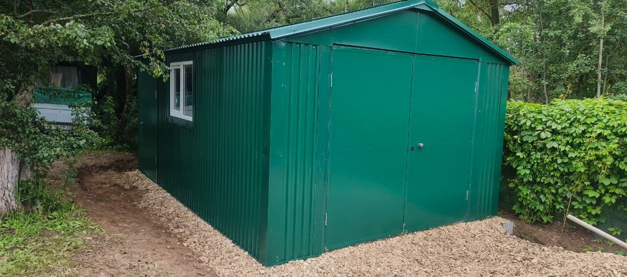 Гараж 4х6х2,9м, металлический, разборный с распашными воротами, окнами и дверкой.