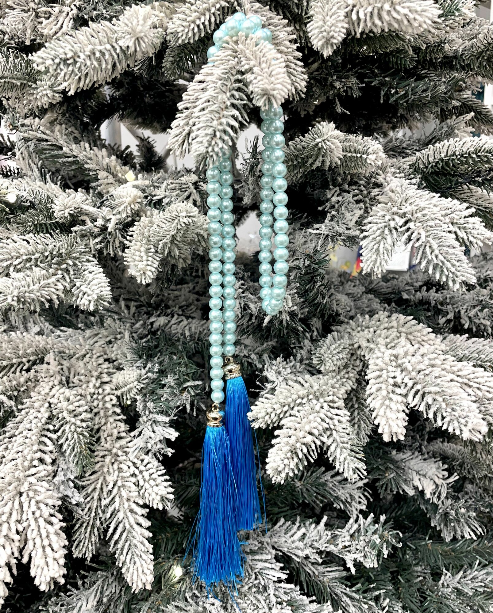 14211 Гирлянда из голубых бусин с кисточками 117 см KARLSBACH