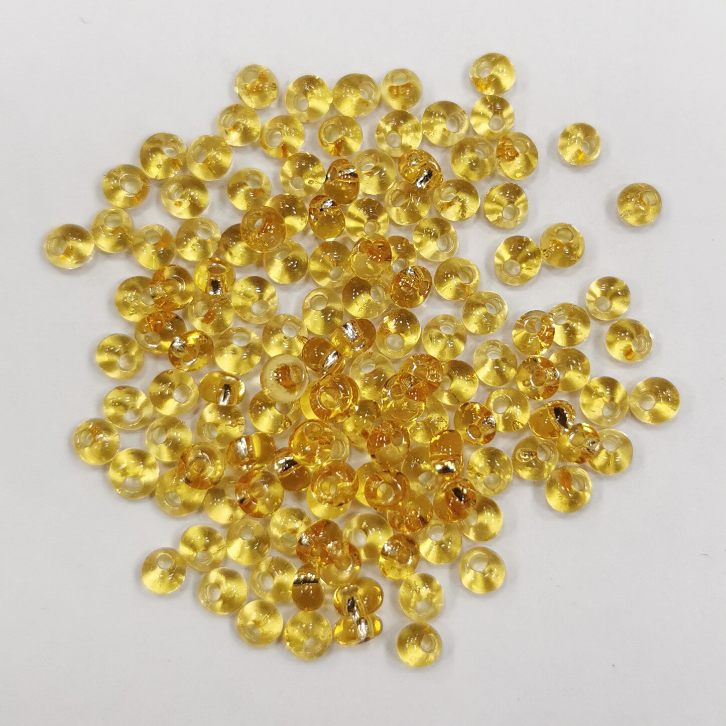 Бисер TOHO Magatama, размер 3мм, цвет #22 (Внутреннее серебрение, светлый топаз), 10 грамм