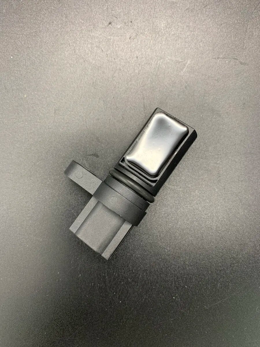 Датчик положения распредвала Новое