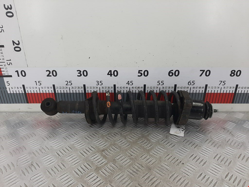 Стойка амортизатора заднего левого Mitsubishi Lancer 10 4162A175 арт. 1795657