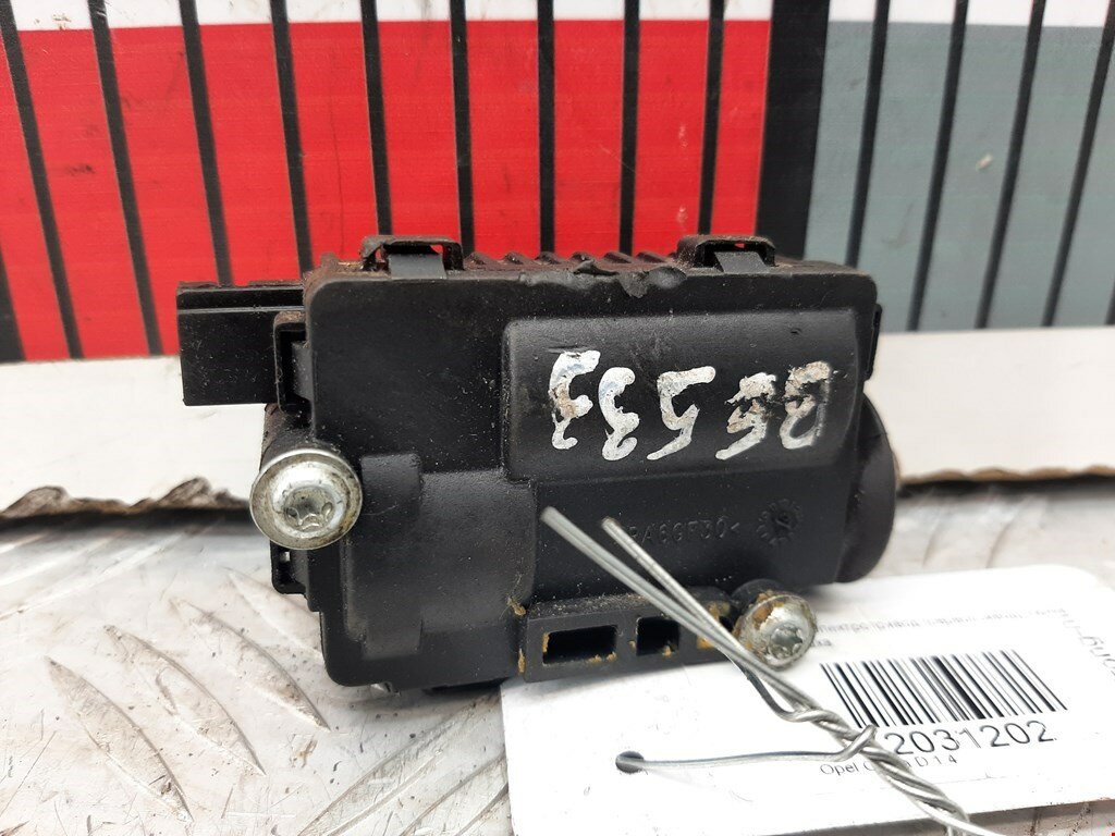 Сервопривод (электропривод моторчик привода) лючка бензобака Opel Corsa D 13208157 арт. 2031202