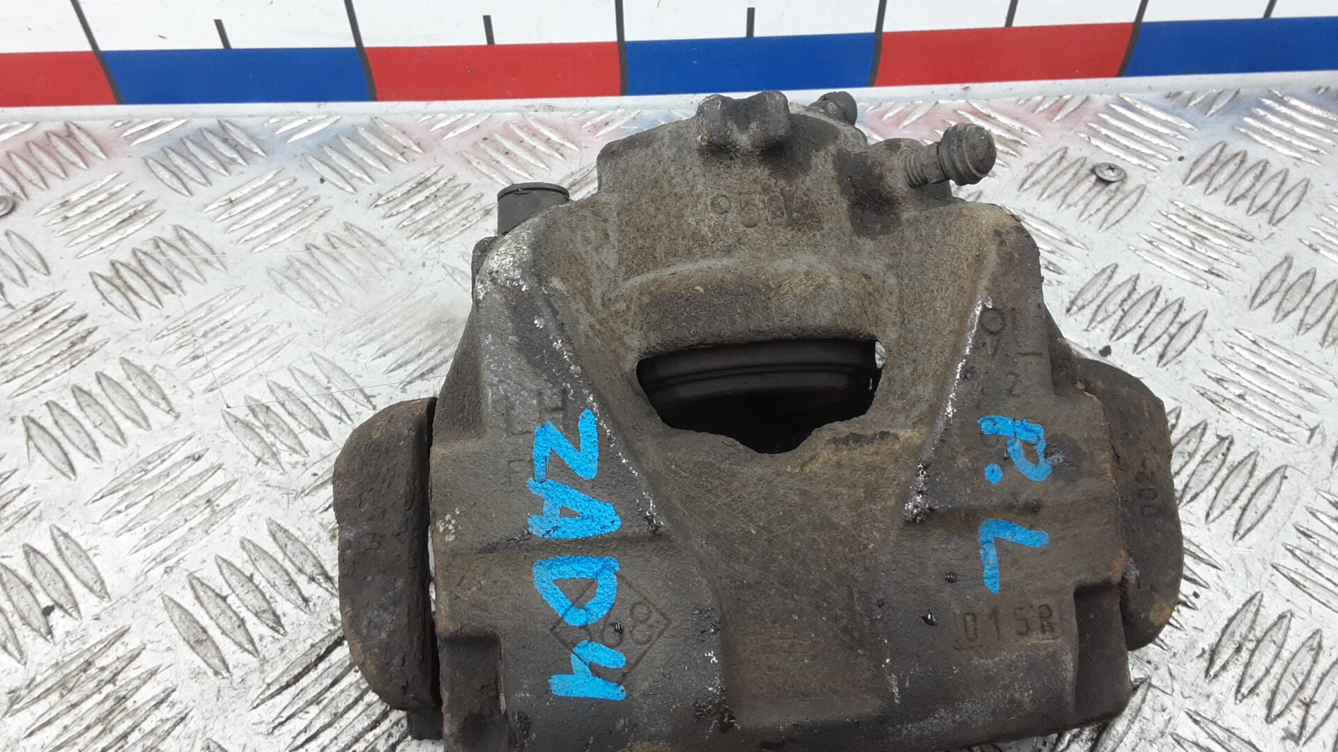 Суппорт тормозной передний левый RENAULT DUSTER 1