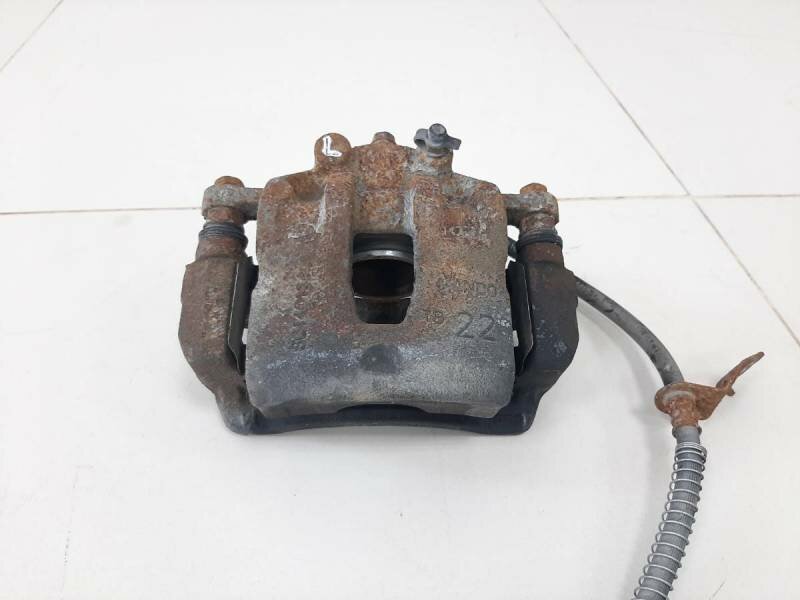 Суппорт передний левый Kia Rio 3 UB 2011-2017 кат.номер: 581104L000