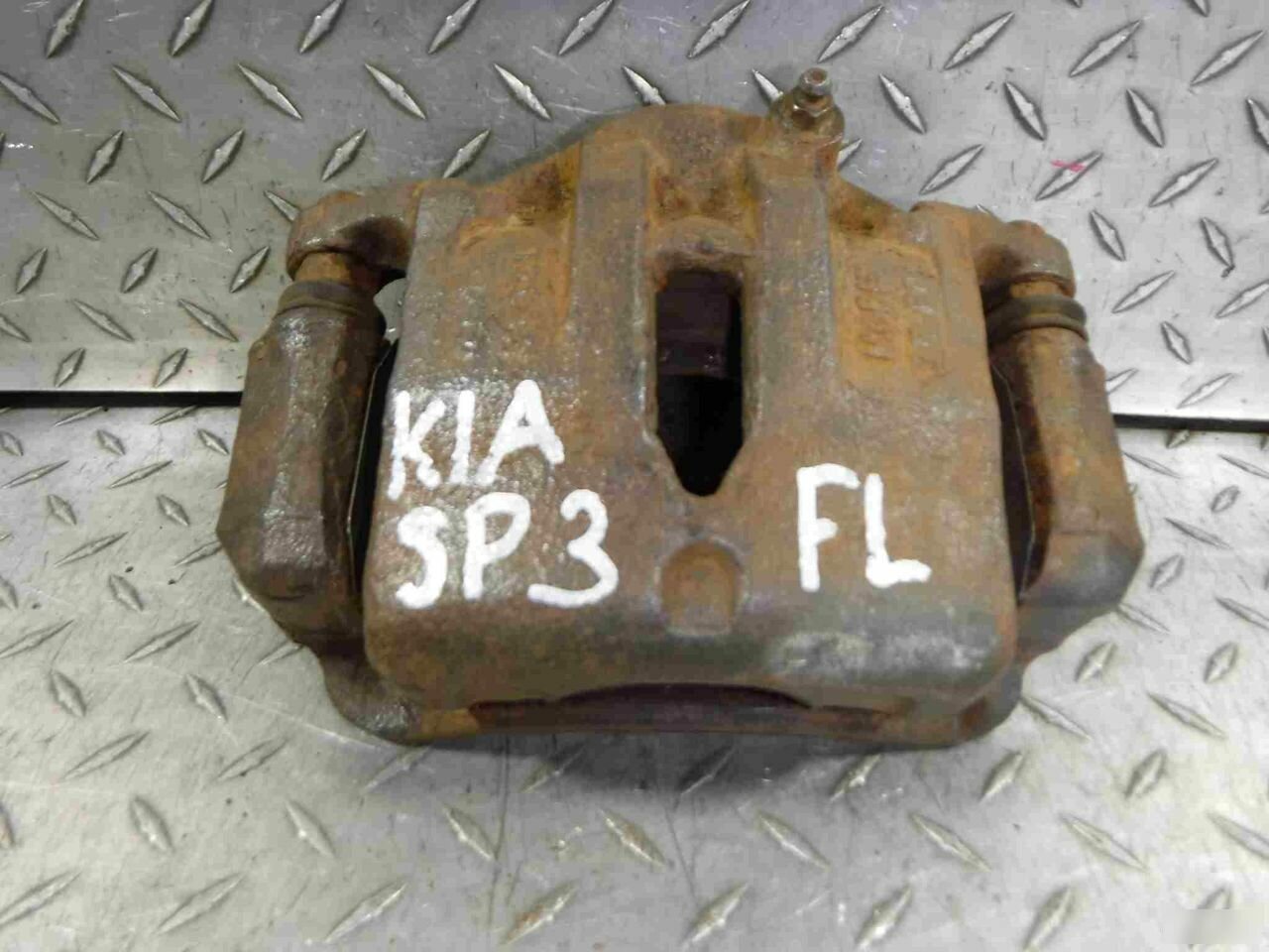 Суппорт тормозной передний левый Kia Sportage III (2010—2014) 581102S700