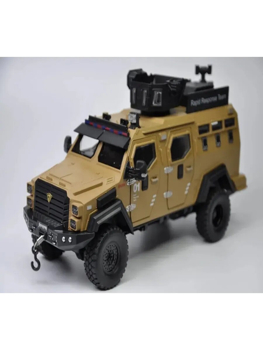 Машинка металлическая Бронеавтомобиль Sabertooth 1:24