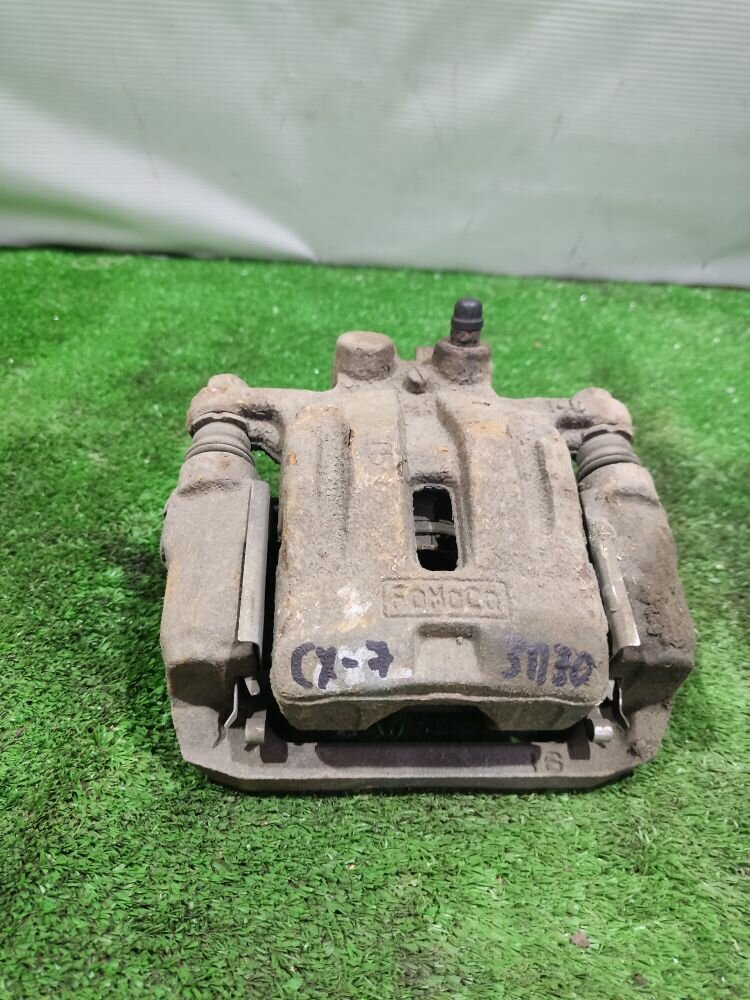 Суппорт задний правый Mazda CX-7