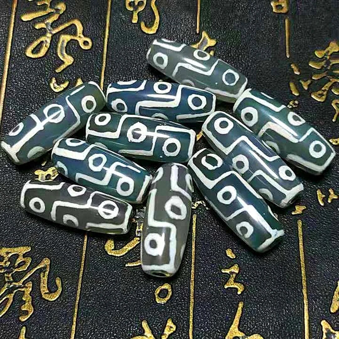 Бусины из халцедона 11х30 мм