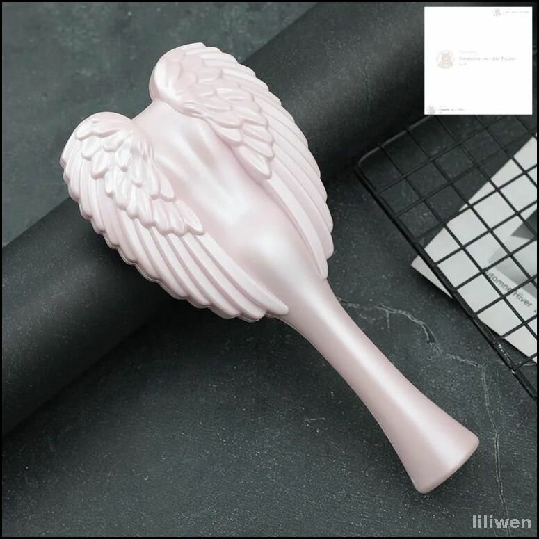 Эксклюзивная расческа Angel Wings с уникальной формой, завоевавшая высокий спрос благодаря своей практичности.