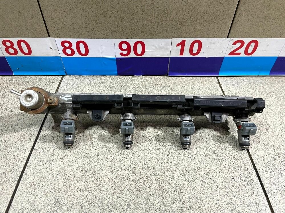 Форсунка топливная VW Polo III 036906031C