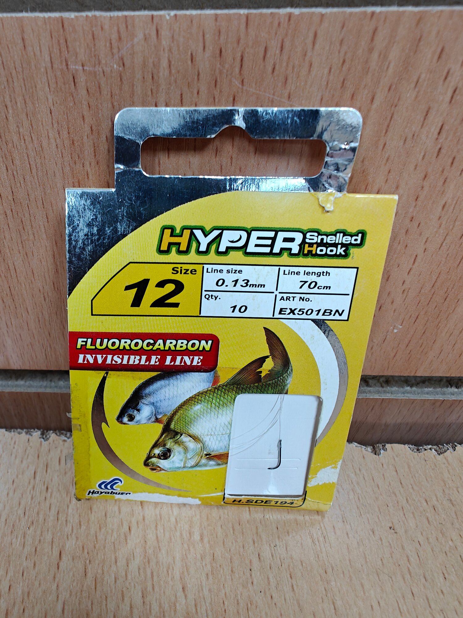 Поводок Hayabusa рыболовный флюрокарбоновый, d-0.13mm, L- 70 см, с крючком №12, артикул EX501N, пачка 10шт.