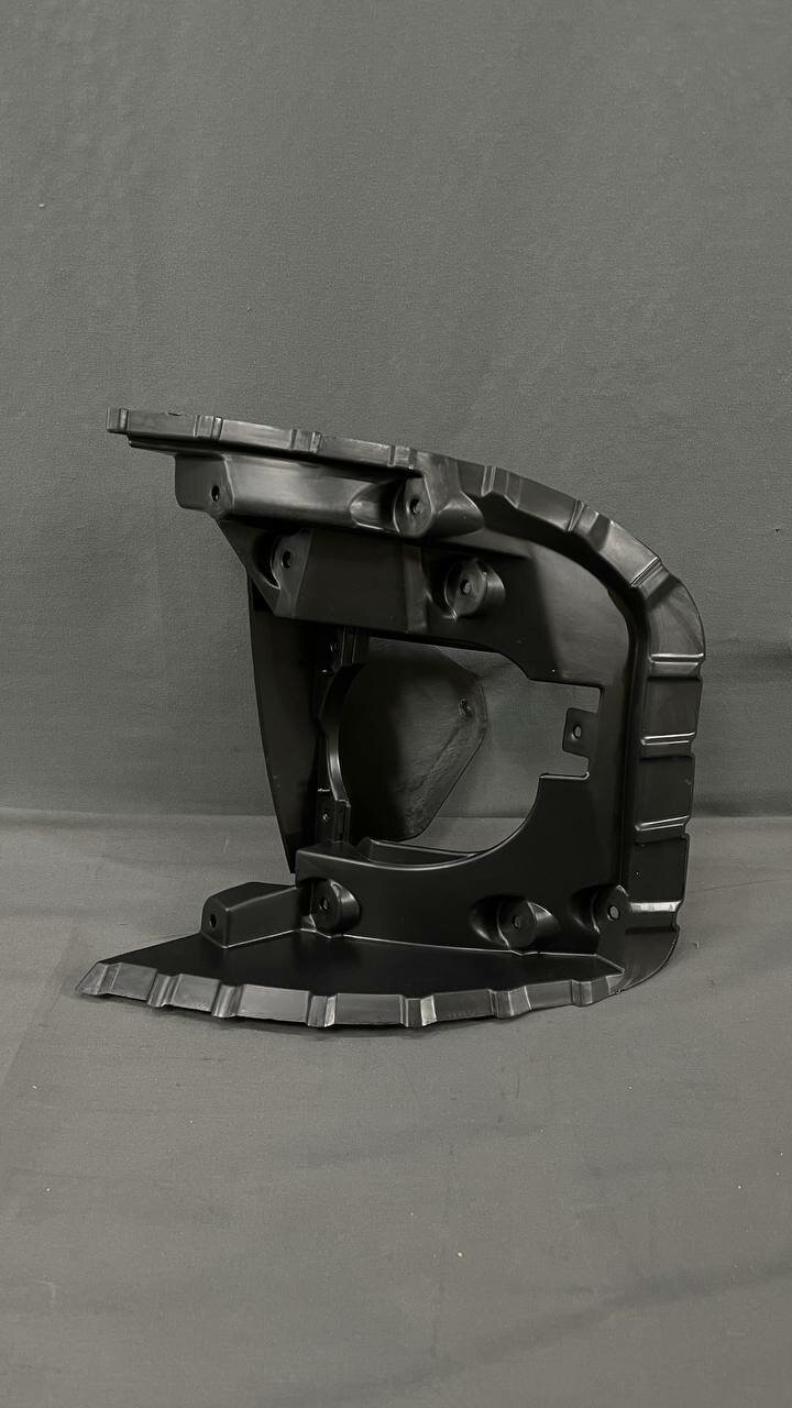 Кронштейн ПТФ левой Mitsubishi