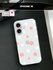 Чехол на Apple iPhone 16 / Айфон 16 с принтом "Розовые и белые цветы", прозрачны...