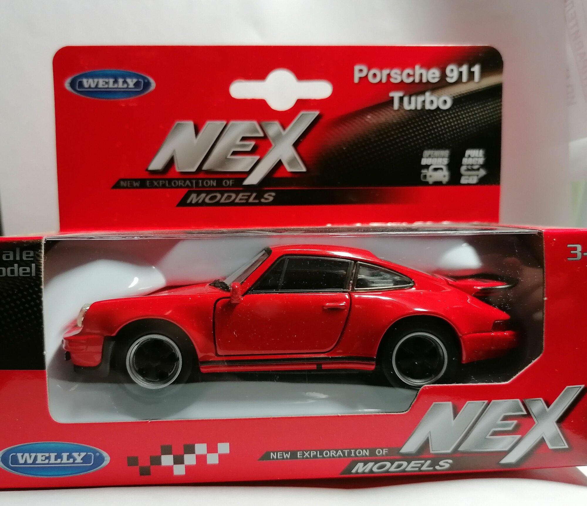 Игрушка Welly Машинка 1:38 Porsche 911 Turbo (930), пруж. мех, красн.