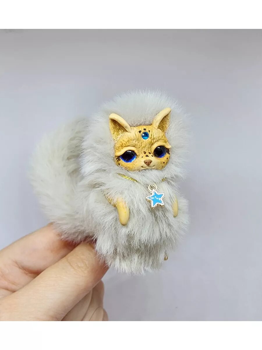 Миниатюрный кот