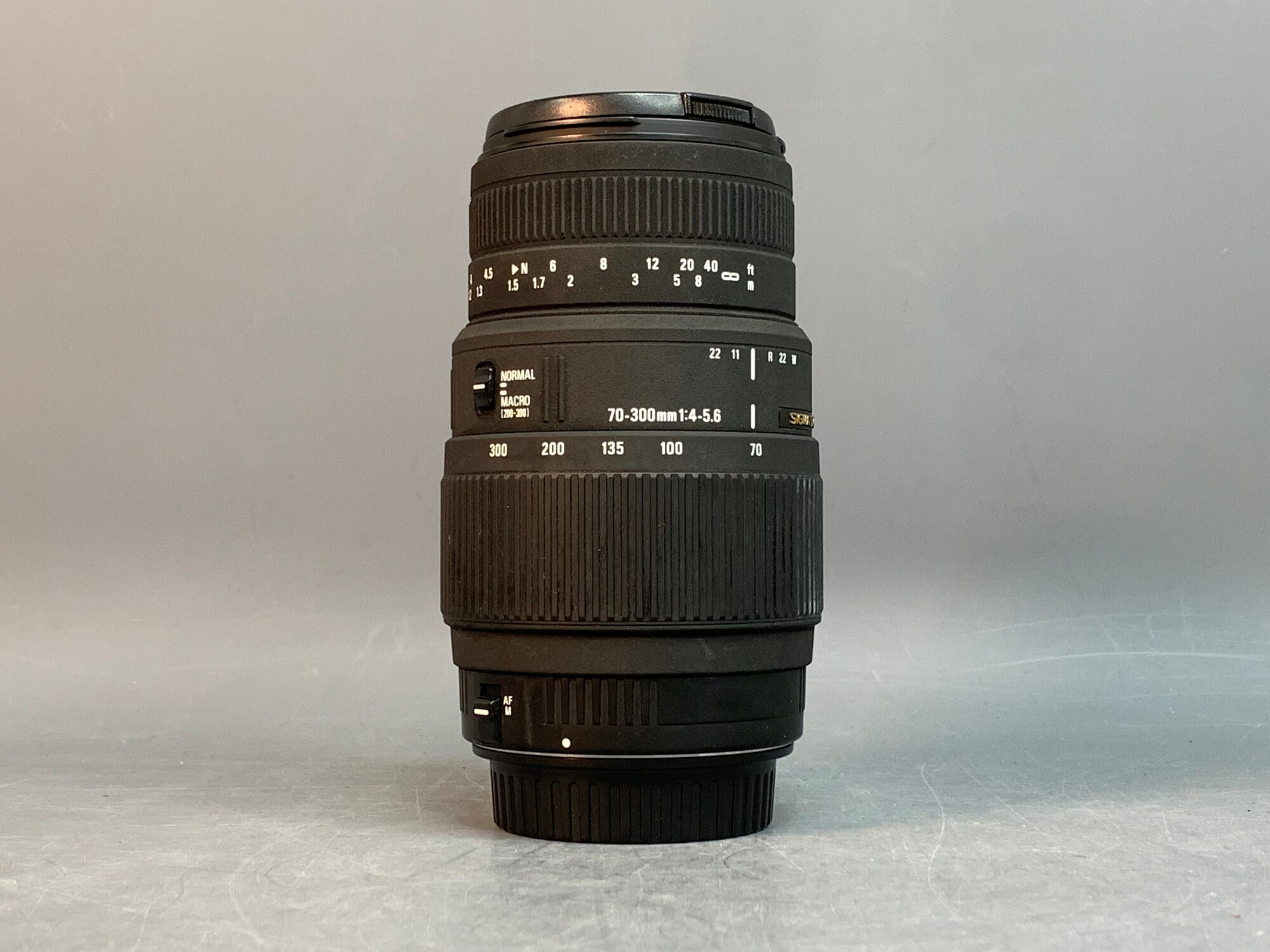 Sigma AF 70-300mm 4-5.6 DG Canon EF царапинки на передней линзе