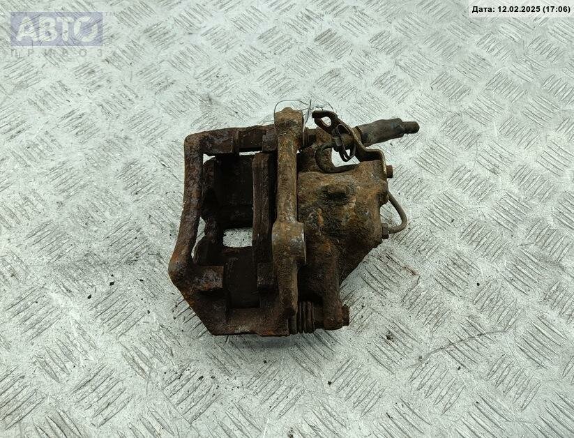 Суппорт передний правый Volkswagen Passat B5