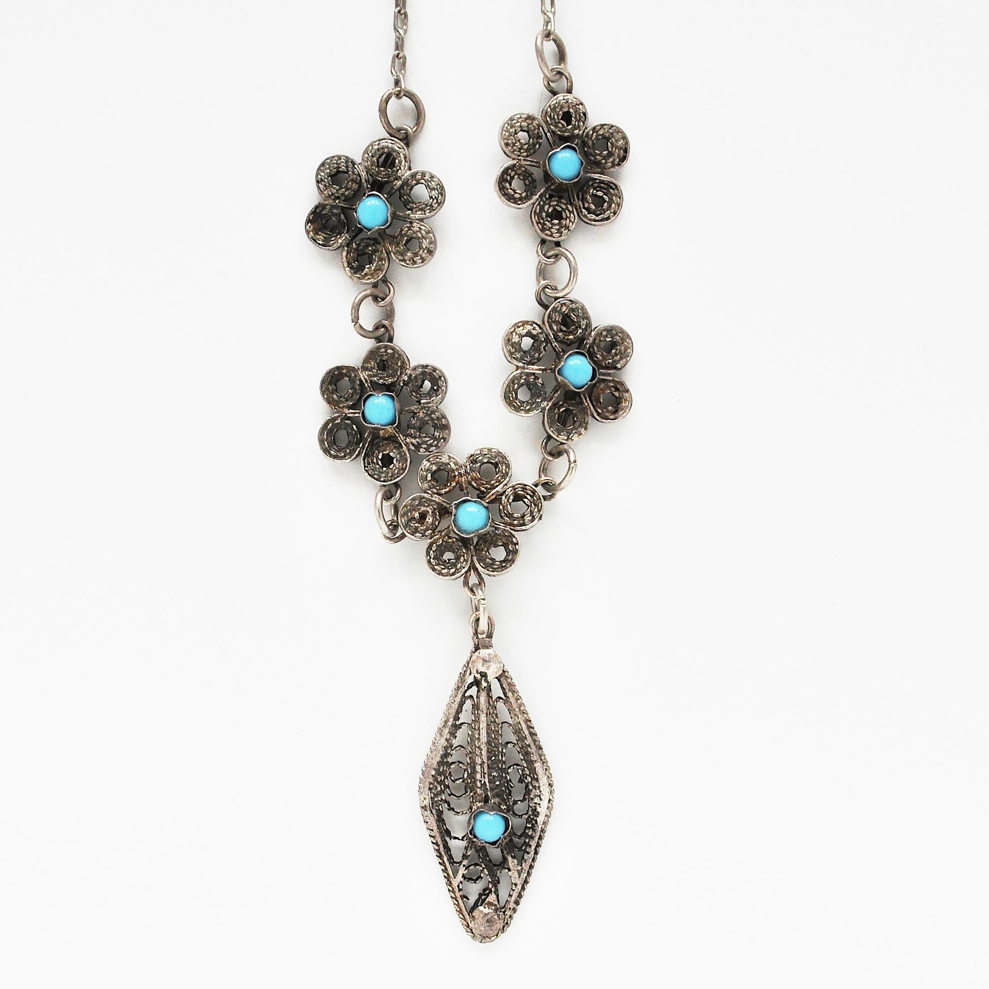 Винтажная подвеска на цепочке "Этника". Бижутерный сплав, композитный материал. США, 1970-1980 годы.