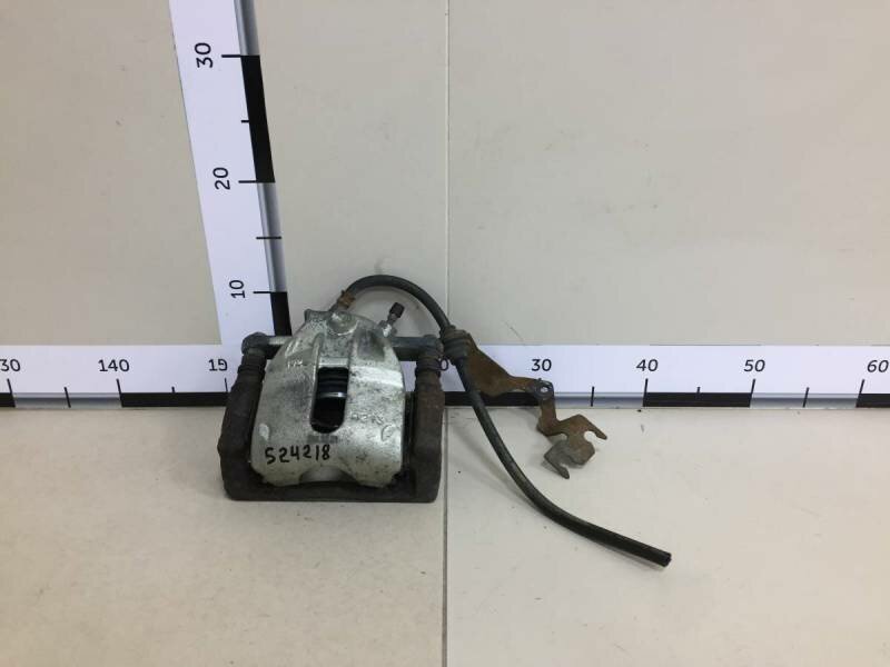 Суппорт передний левый Renault Duster 2012 кат.номер: 7701208332