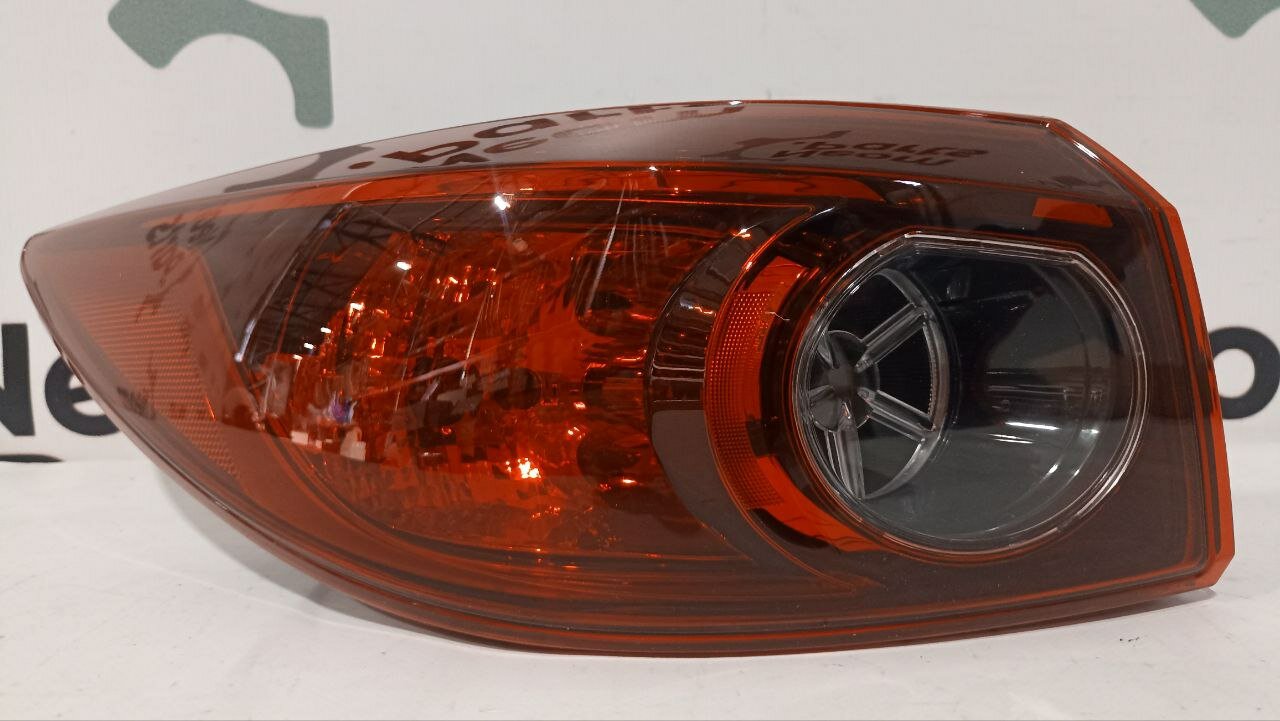 Фонарь задний левый наружный Mazda 3 BM 2013-2016