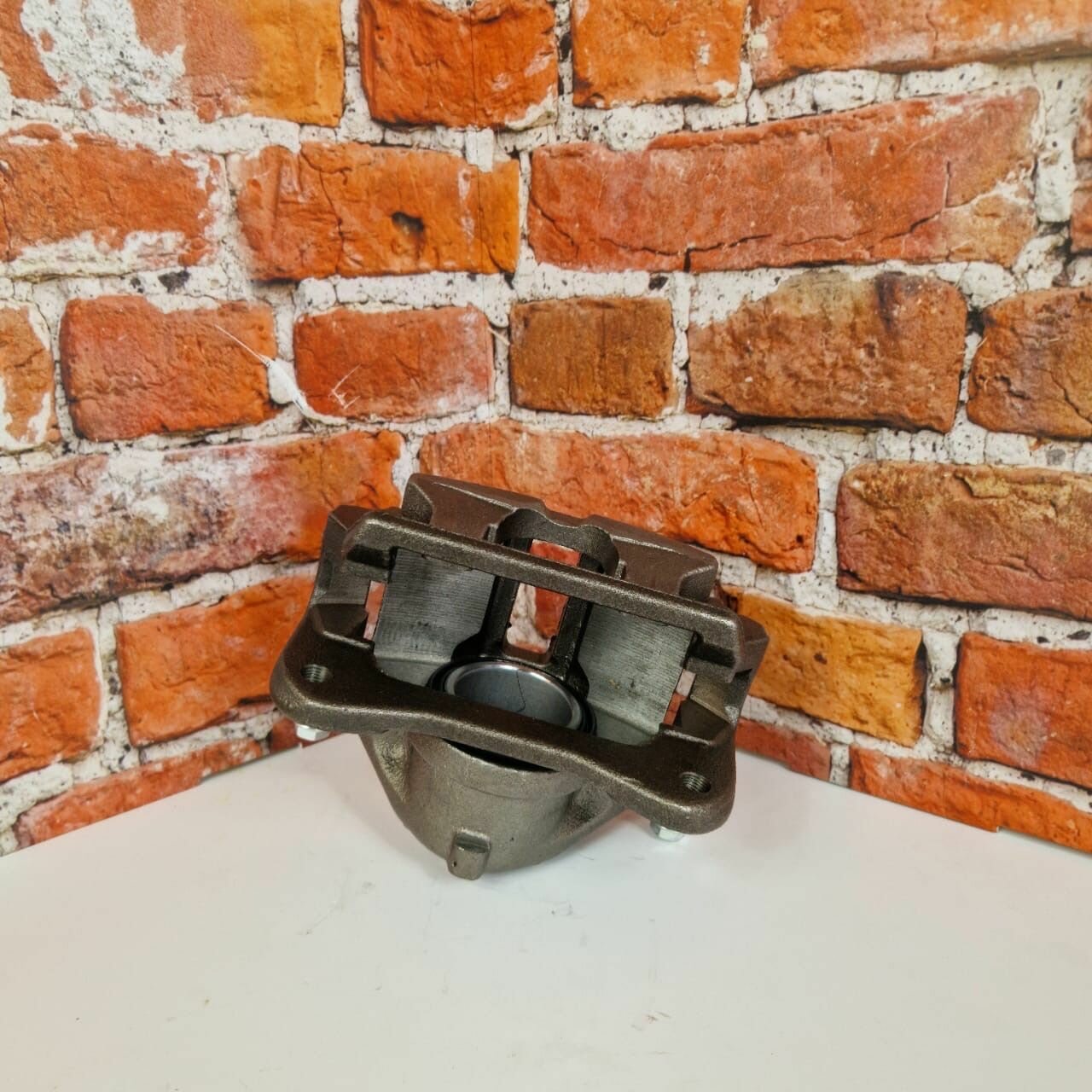 Суппорт для а/м газ 3302 (левый)