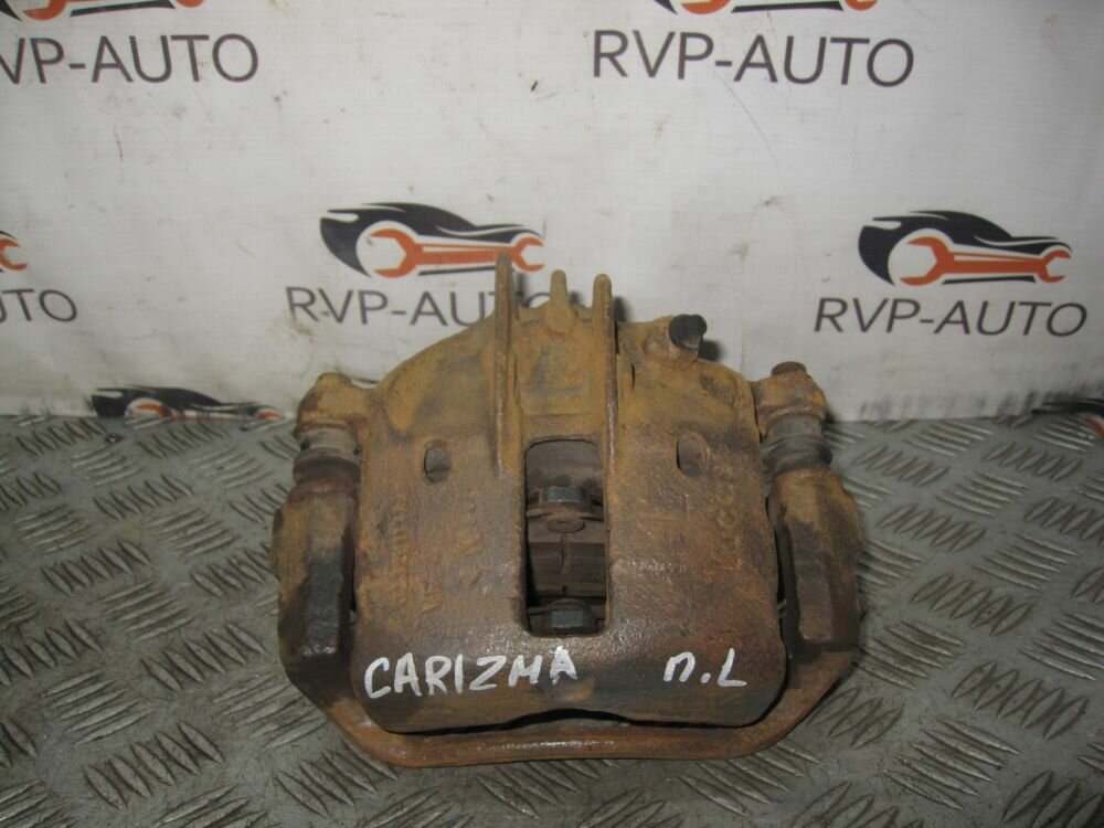 Суппорт передний левый Mitsubishi Carisma 1999-04 M863311