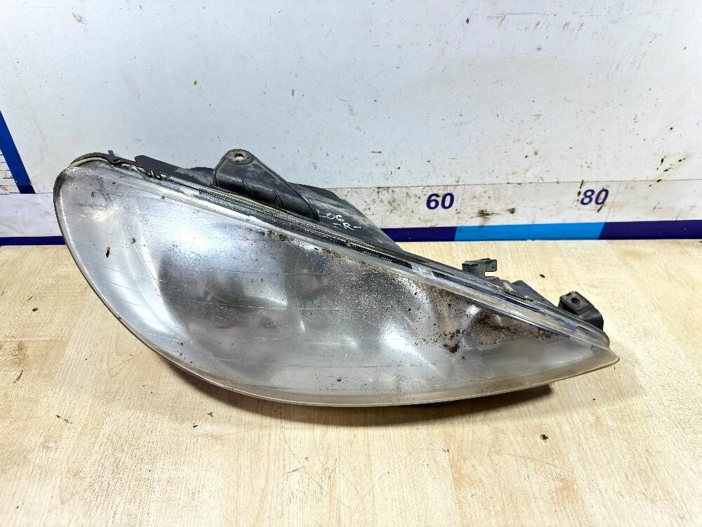 Фара правая Peugeot 206 9628666780