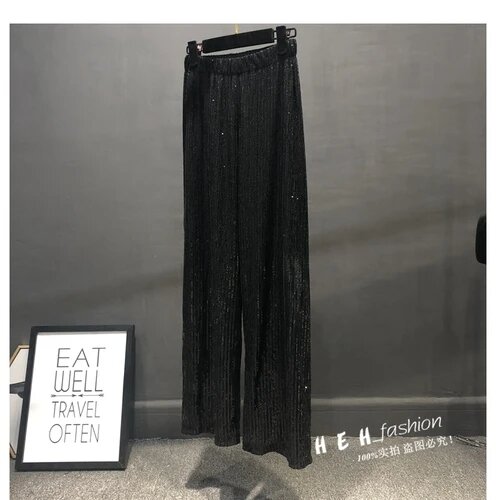 Брюки женские черные блестящие XL