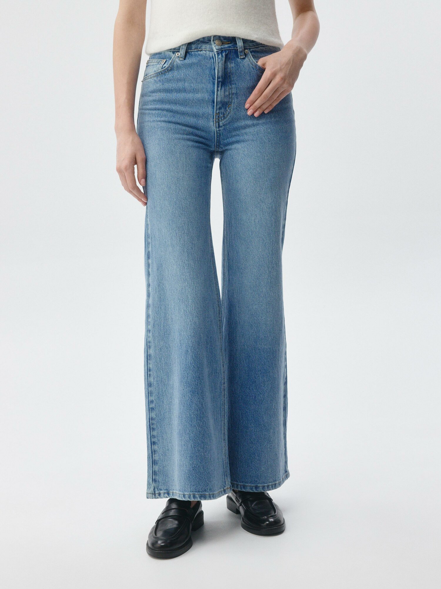 Джинсы клеш 