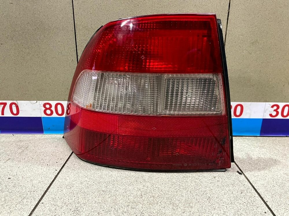 Фонарь задний левый Opel Vectra B 90568047