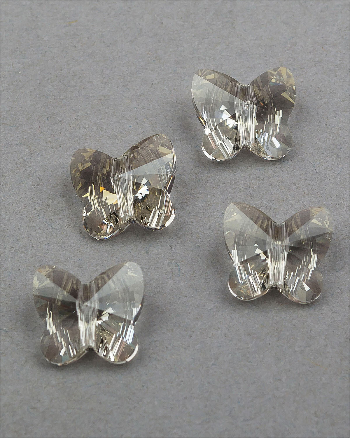 Бусины Swarovski в виде бабочек из стекла, цвет Crystal Silver Shade (#001-SSHA), размер 12 мм, 4 шт.